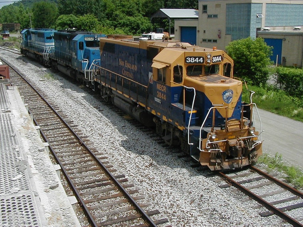 NECR 3844 & 5032, GSCX 7369 shut off & parked on loco track in yard